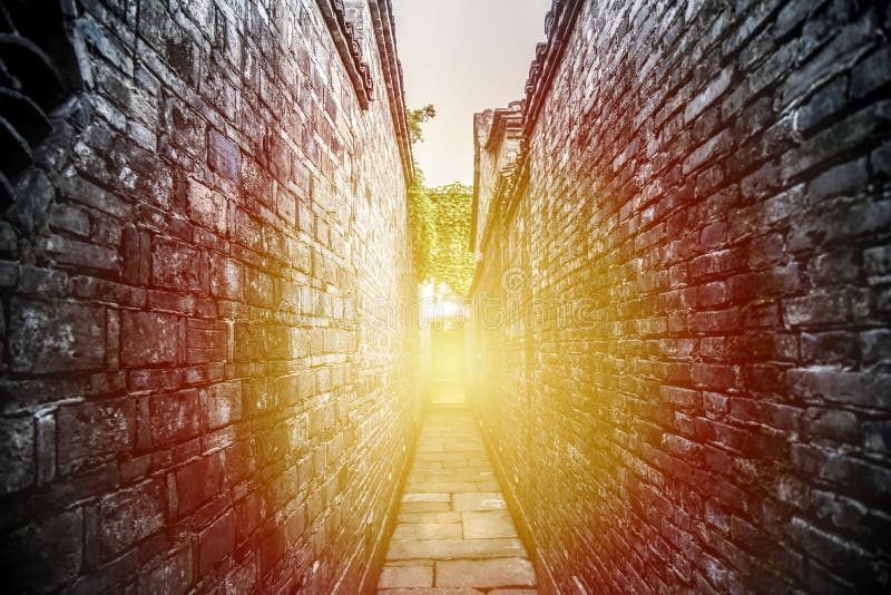 Two Sided Brick Wall with a Small Pathway, If Go Straight Forward, You ...