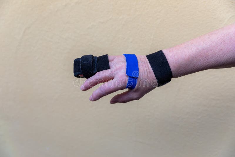 Two Sided Finger Splint with Two Hook and Loop Straps on a Broken ...