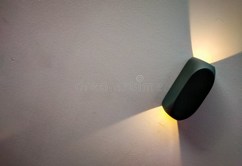 Two Sided Wall Light with Yellow Light Stock Photo - Image of style ...