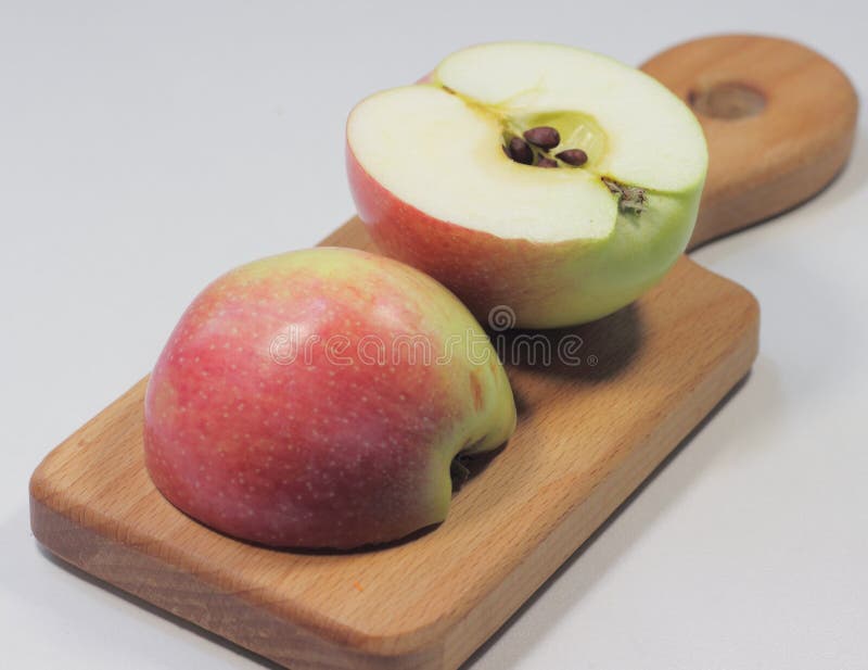 Two sides of the apple stock image. Image of core, diet - 58839051