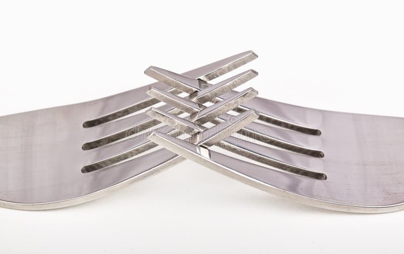 Two silver forks tangled stock photo. Image of restaurant - 27247822