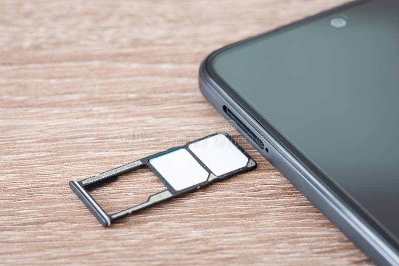 Two Sim Cards of Different Mobile Operators in a Phone Tray Stock Photo ...