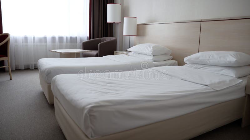 Two Single Beds in a Cozy Hotel Room. Two Elegant Single Beds in a ...