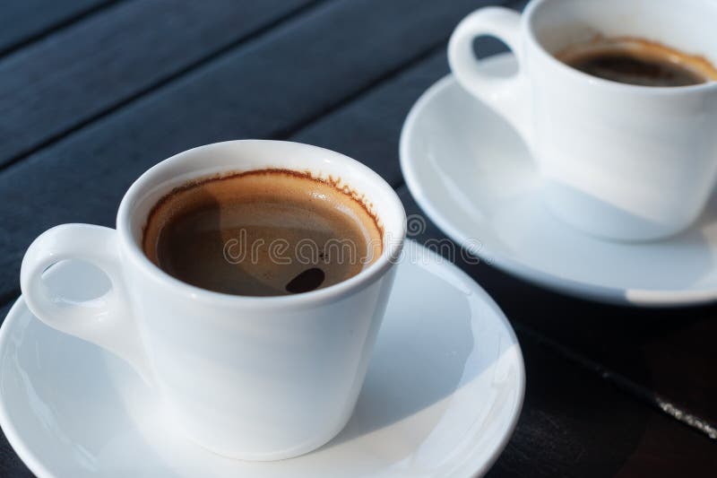 Two Single and Double Cups of Espresso Coffee Stock Photo - Image of ...