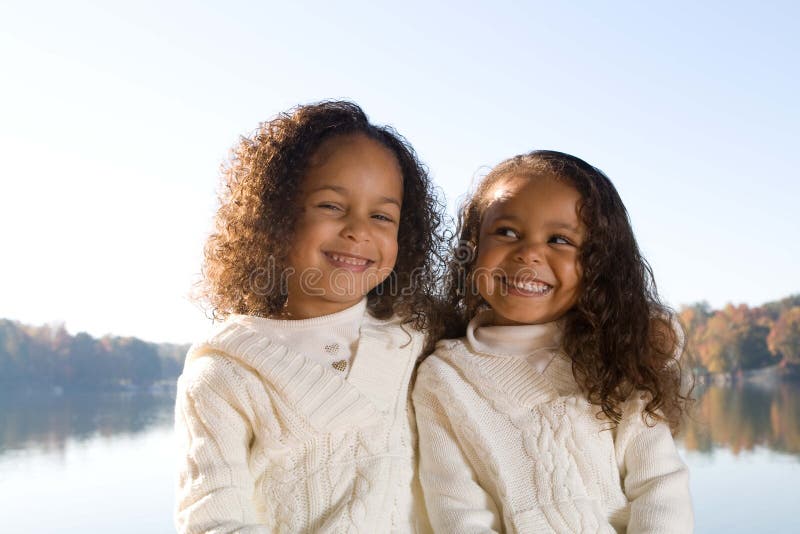 Two sisters stock image. Image of ethnic, outdoors, schoolkids - 7139271