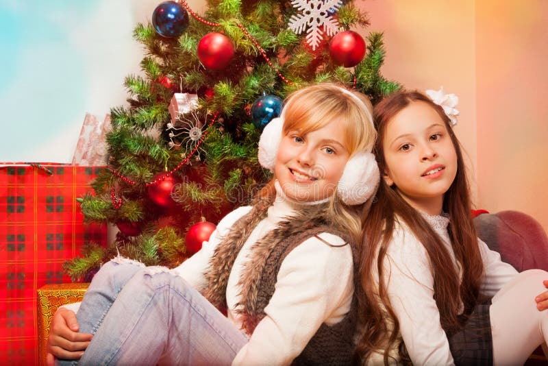 Two Sisters Celebrating Christmas Stock Photo - Image of decorations ...