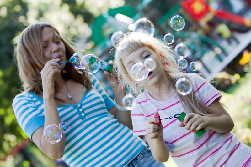 Two sisters having fun. stock image. Image of active - 22453555
