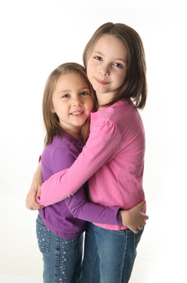 Two sisters hugging stock photo. Image of laughing, kids - 17639558