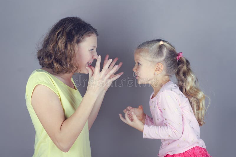 Sisters Quarrel Over a Toy, they Cannot Share a Teddy Bear Stock Image ...