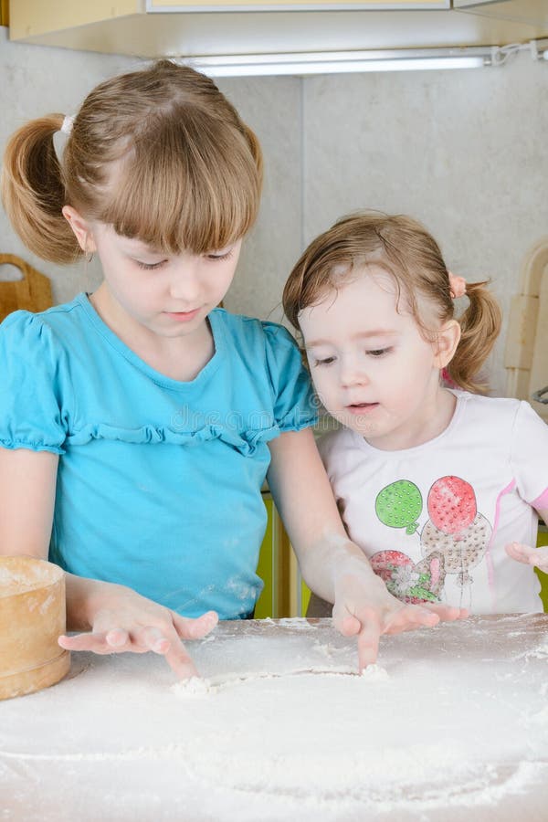 Two Sisters Sifts the Flour for Dough Stock Image - Image of baking ...