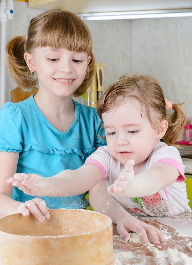 Two Sisters Sifts the Flour for Dough Stock Image - Image of hand ...