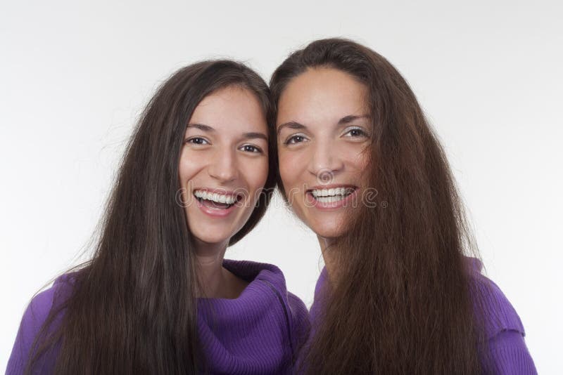 Two sisters smiling stock photo. Image of women, enjoying - 16563492