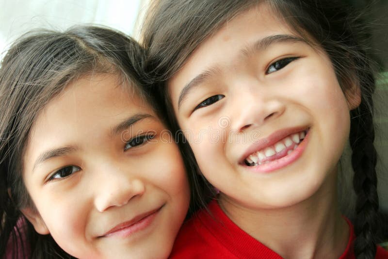 Two sisters smiling stock image. Image of friends, children - 28360825