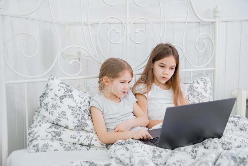Two Sisters Study on Computer Online. Stay Home. Stock Image - Image of ...