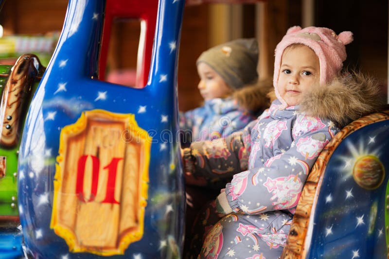 Two Sisters in Train Carousel in Amusement Park Stock Image - Image of ...