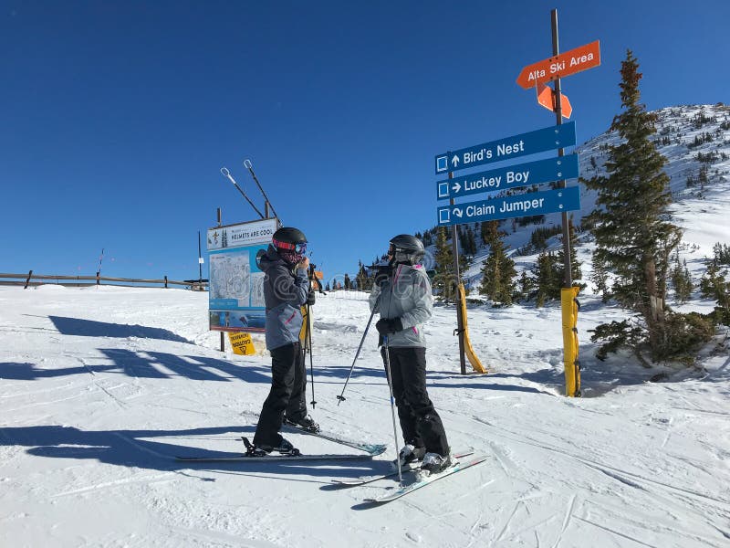 Two Skiers Taking a Short Break Editorial Stock Photo - Image of ...