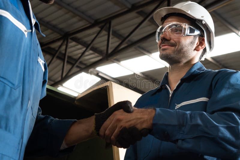 Two Skillful Factory Engineer or Worker Showing Teamwork and ...