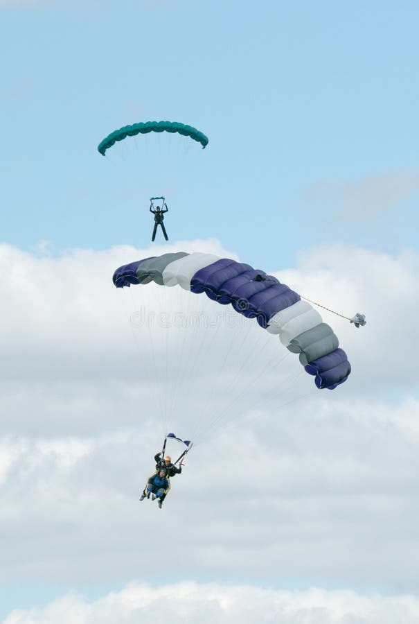 Two Skydivers Performing Skydiving with Parachutes Editorial Stock ...