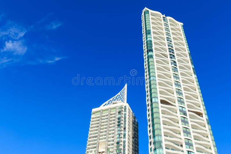 Two Skyscrapers and Blue Sky Stock Image - Image of glass, skyscraper ...