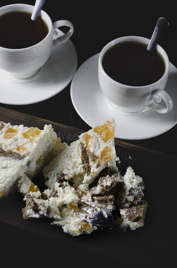 Two Slices of Homemade Cake and Two Cups of Tea in the Background Stock ...