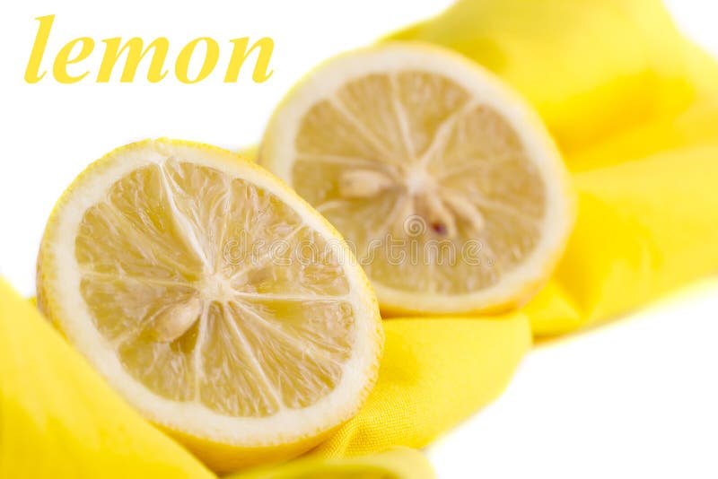 Two Slices of Lemon on Yellow Cloth Stock Image - Image of lemon, piece ...