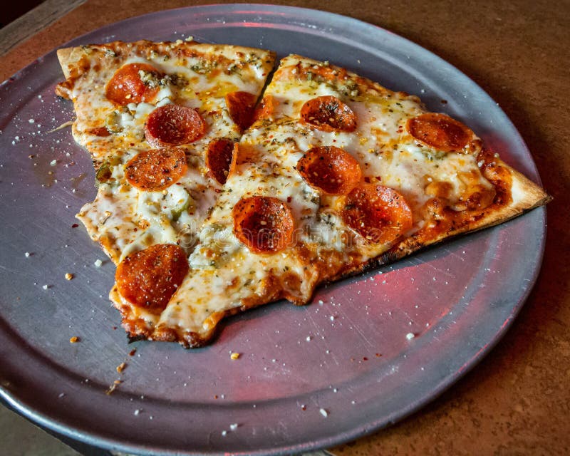 Two slices of Pizza 1 stock photo. Image of fresh, table - 342561238