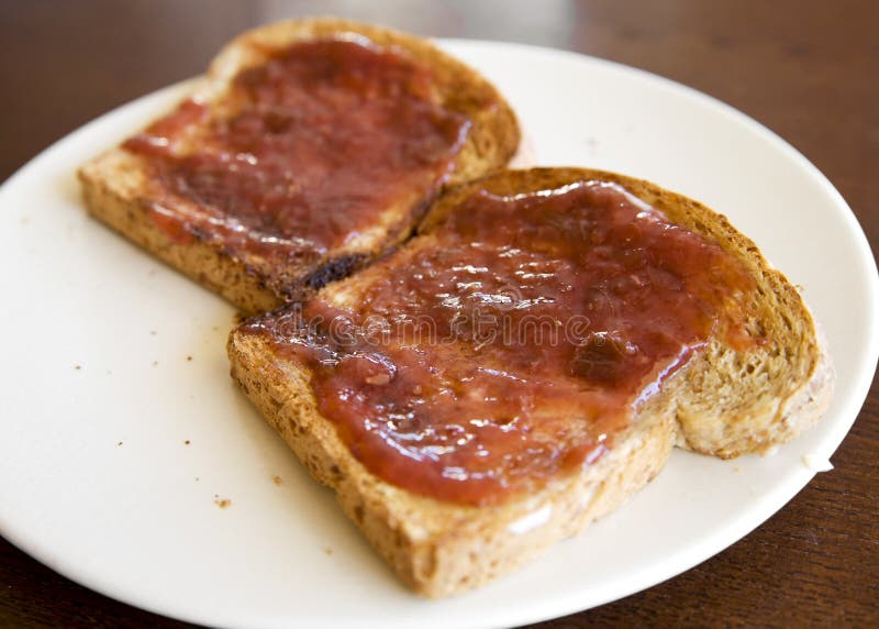 Two Slices of Toast stock photo. Image of shallow, plum - 8668848
