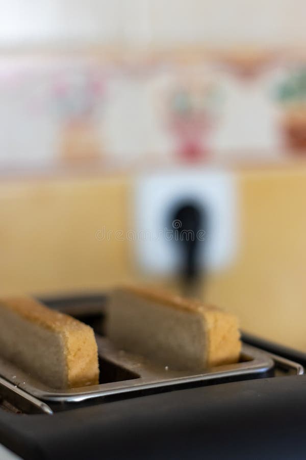 Two Slices of Toast in Toaster. Selective Focus To Use Like Background ...
