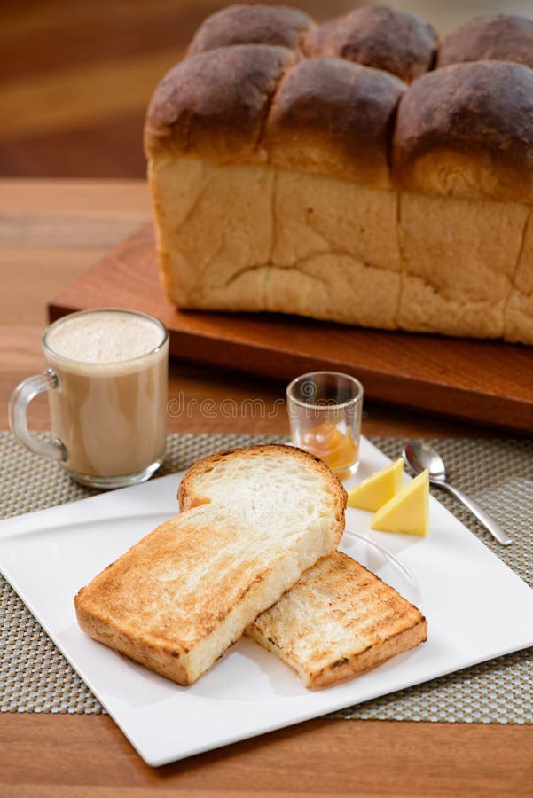 Two Slide of Toast and a Loaf of Bread Stock Image - Image of meal ...