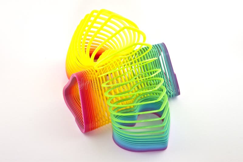 Two slinky toys editorial image. Image of childhood, head - 33314435