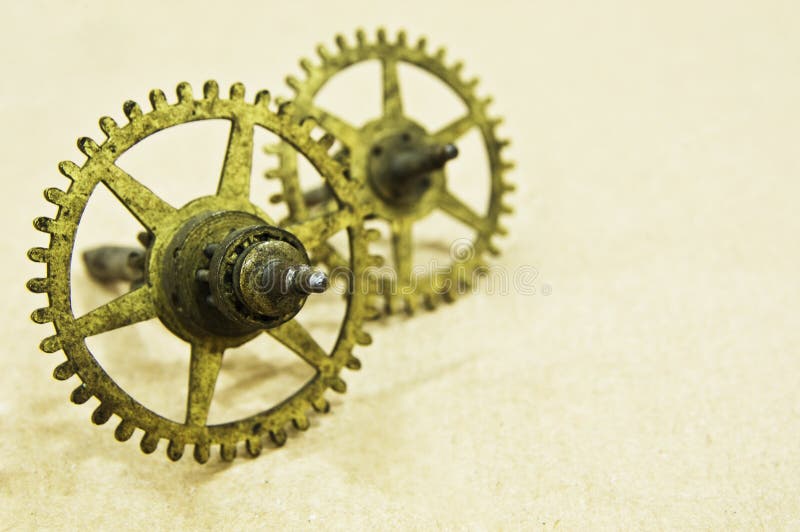 Two small bronze cogs stock photo. Image of garbage, business - 17808276
