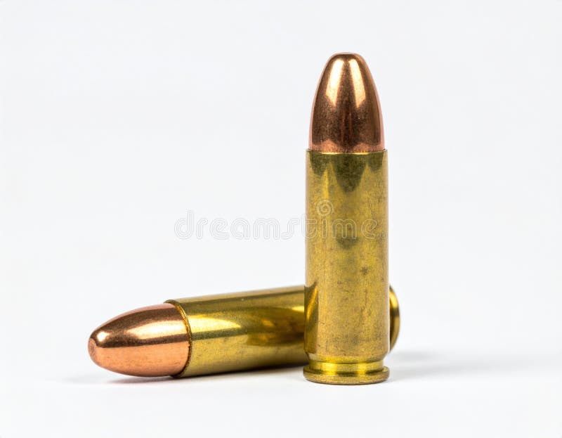 Two Small-Caliber Bullets with Golden Casings Stock Image - Image of ...