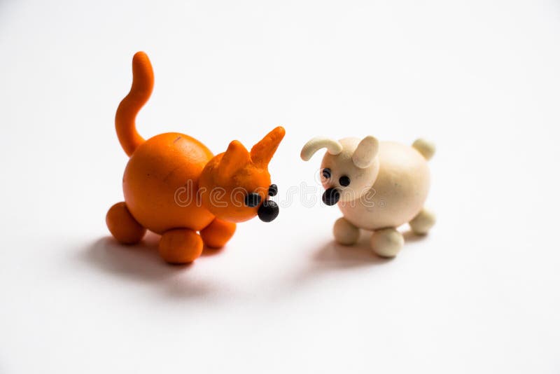 Two Small Dogs of Orange and White on a Light Background Made of ...