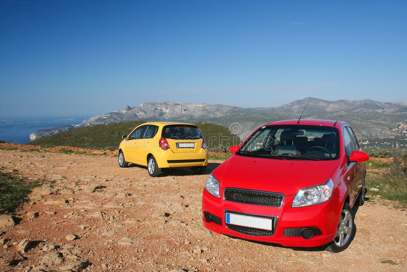 Two small family cars stock photo. Image of automobile - 5674926