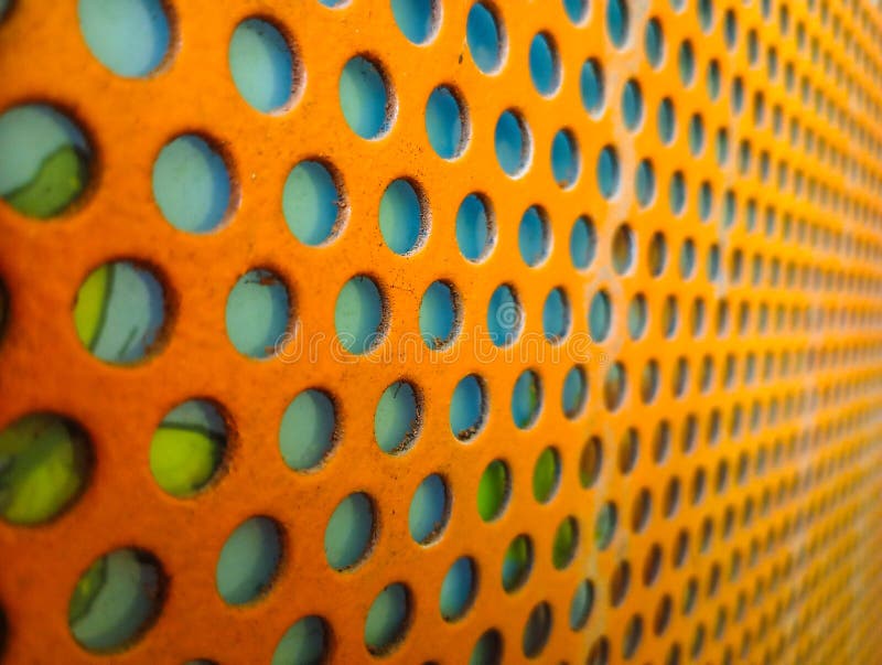 Two Small Orange Perforated Metal Abstract Texture on Power Lines Stock ...