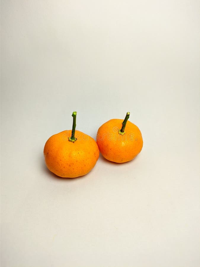 Two Small Oranges that Have an Orange Tint Stock Image - Image of ...