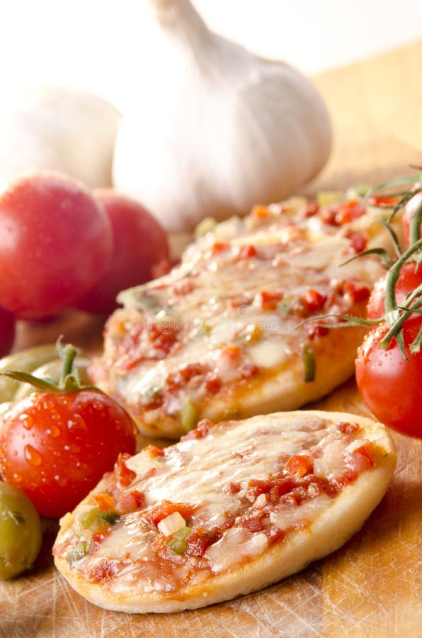 Two small pizzas stock image. Image of melted, pizza - 21831149