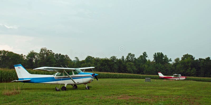 Two Small Planes on Rural Air Strip Stock Photo - Image of corn, bright ...
