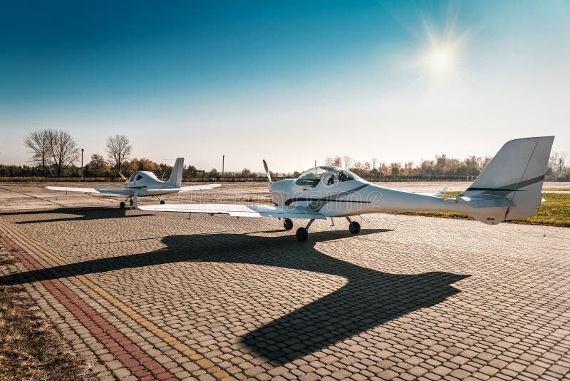 Two small planes stock photo. Image of airfield, transport - 176925230
