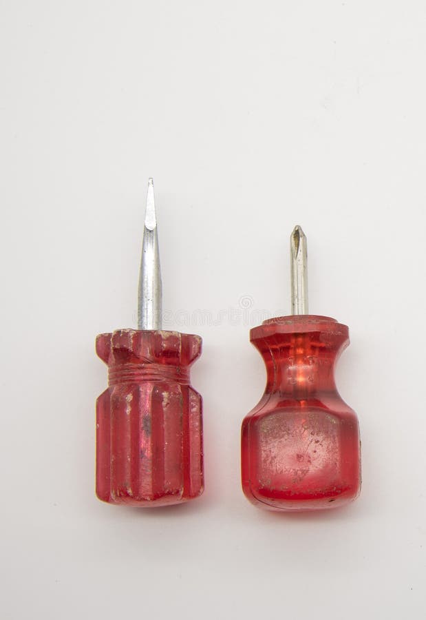 Two Small Screwdrivers with Red Handles on a White Background Stock ...