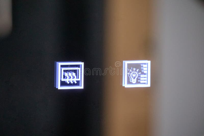 .two Small, Square, Illuminated Symbols on a Dark Background Stock ...