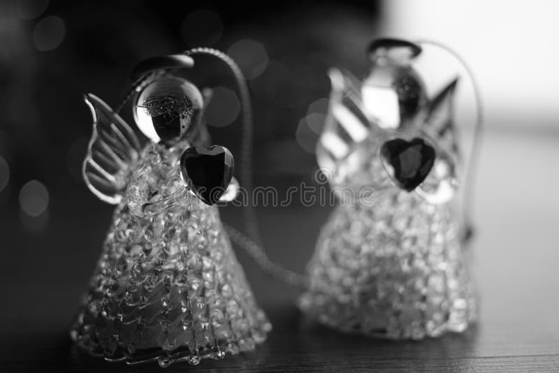 Two Small Statues of Angels on the Table Stock Image - Image of holy ...