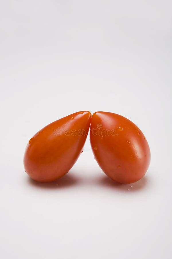 Two small tomato stock photo. Image of chaste, symbol - 8462358