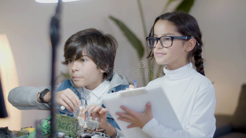 Two Smart Children Doing School Project in Engineering Stock Video ...