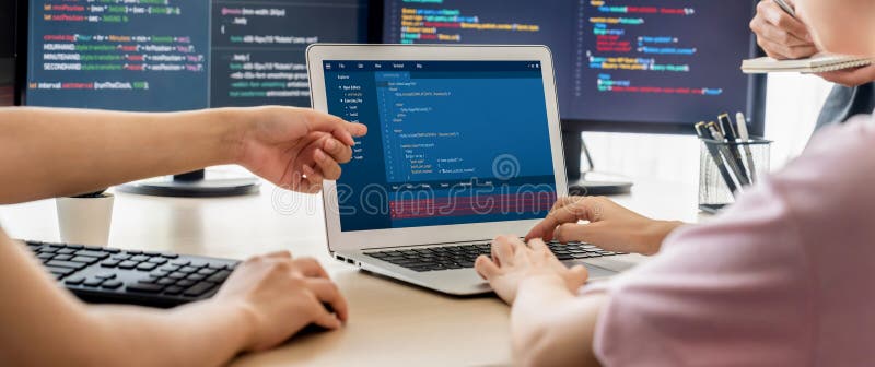 Two Smart Computer Engineers Working Together To Solve Program Code. Burgeoning. Stock Image ...