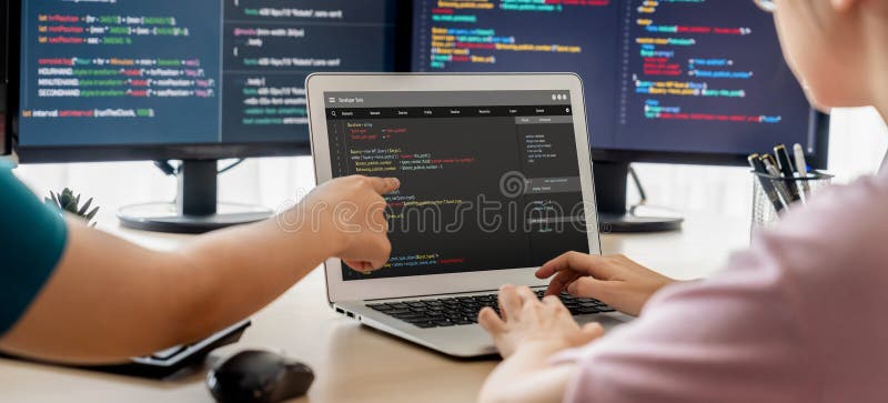 Two Smart Computer Engineers Working Together To Solve Program Code. Burgeoning. Stock Image ...