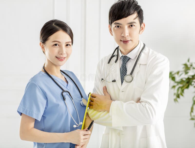 Two Smart and Professional Smiling Doctors Stock Image - Image of ...
