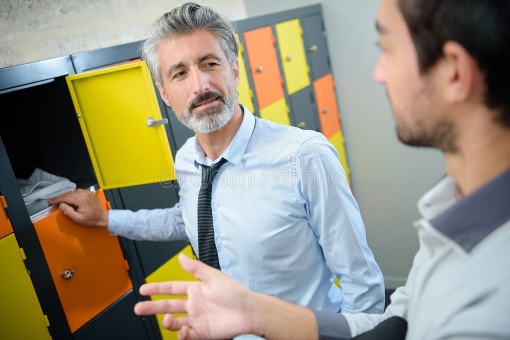 Two Smartly Dressed Men in Locker Room Stock Photo - Image of adult ...