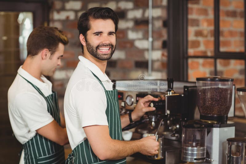 Two Smiling Baristas Preparing Coffee Stock Image - Image of drink ...