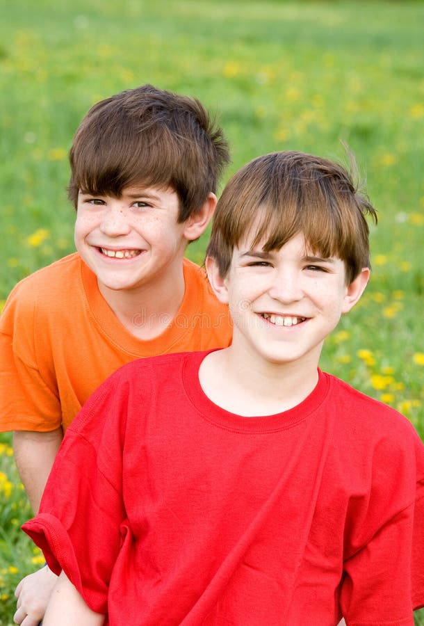 Two Smiling Brothers stock image. Image of bright, buddies - 8738673